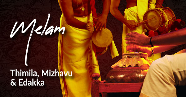 Captivating beat of the percussion instrument Mizhavu with two other ...